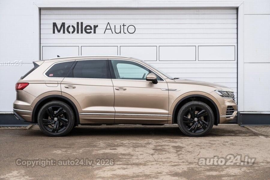 Brown Volkswagen Touareg 2018 in Riga, with an engine capacity of 3.00 L and mileage of 194 thousand km for 31500 €, photo 5 on AUTOMOTO.COM.LV