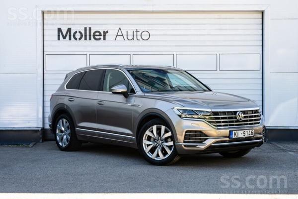 Brown Volkswagen Touareg 2018 in Riga, with an engine capacity of 3.00 L and mileage of 213 thousand km for 27950 €, photo 2 on AUTOMOTO.COM.LV