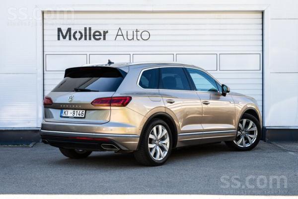 Brown Volkswagen Touareg 2018 in Riga, with an engine capacity of 3.00 L and mileage of 213 thousand km for 27950 €, photo 3 on AUTOMOTO.COM.LV