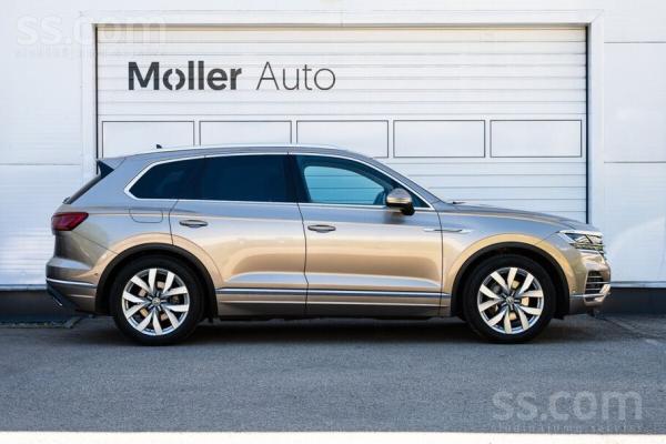 Brown Volkswagen Touareg 2018 in Riga, with an engine capacity of 3.00 L and mileage of 213 thousand km for 27950 €, photo 5 on AUTOMOTO.COM.LV