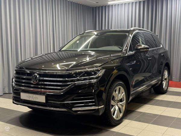 Brown Volkswagen Touareg 2019 in Riga, with an engine capacity of 2.97 L and mileage of 99 thousand km for 33990 €, photo 1 on AUTOMOTO.COM.LV