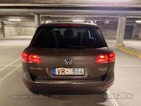 Brown Volkswagen Touareg 2012 in Valmiera, with an engine capacity of 3.00 L and mileage of 368 thousand km for 8990 €, photo 4 on AUTOMOTO.COM.LV