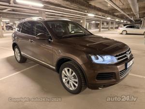 Brown Volkswagen Touareg 2012 in Valmiera, with an engine capacity of 3.00 L and mileage of 368 thousand km for 8990 €, photo 8 on AUTOMOTO.COM.LV