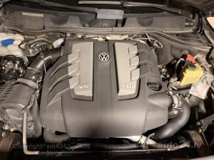 Brown Volkswagen Touareg 2012 in Valmiera, with an engine capacity of 3.00 L and mileage of 368 thousand km for 8990 €, photo 14 on AUTOMOTO.COM.LV