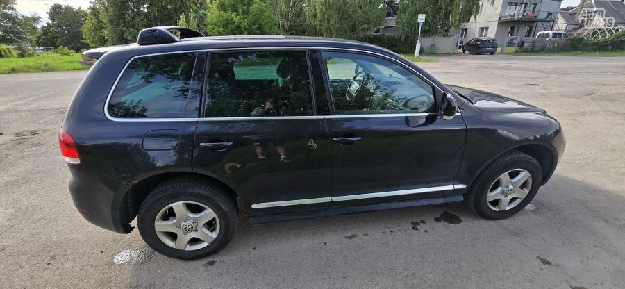 Volkswagen Touareg 2007 in Kaunas, with an engine capacity of 3.00 L and mileage of 272 thousand km for 5600 €, photo 5 on AUTOMOTO.COM.LV