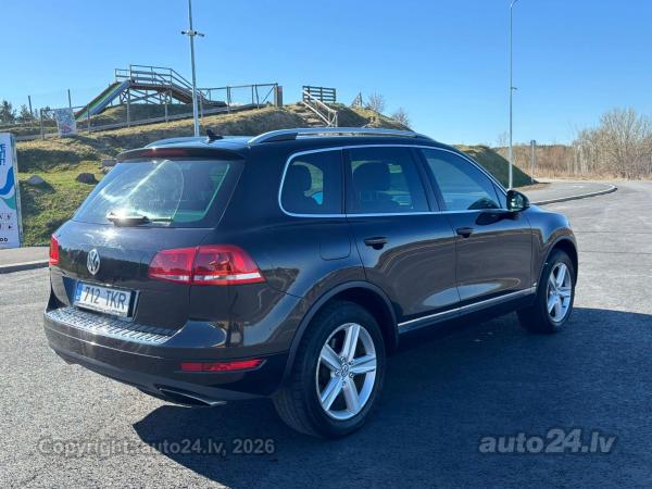 Volkswagen Touareg 2010 in Narva, with an engine capacity of 3.00 L and mileage of 290 thousand km for 7990 €, photo 4 on AUTOMOTO.COM.LV