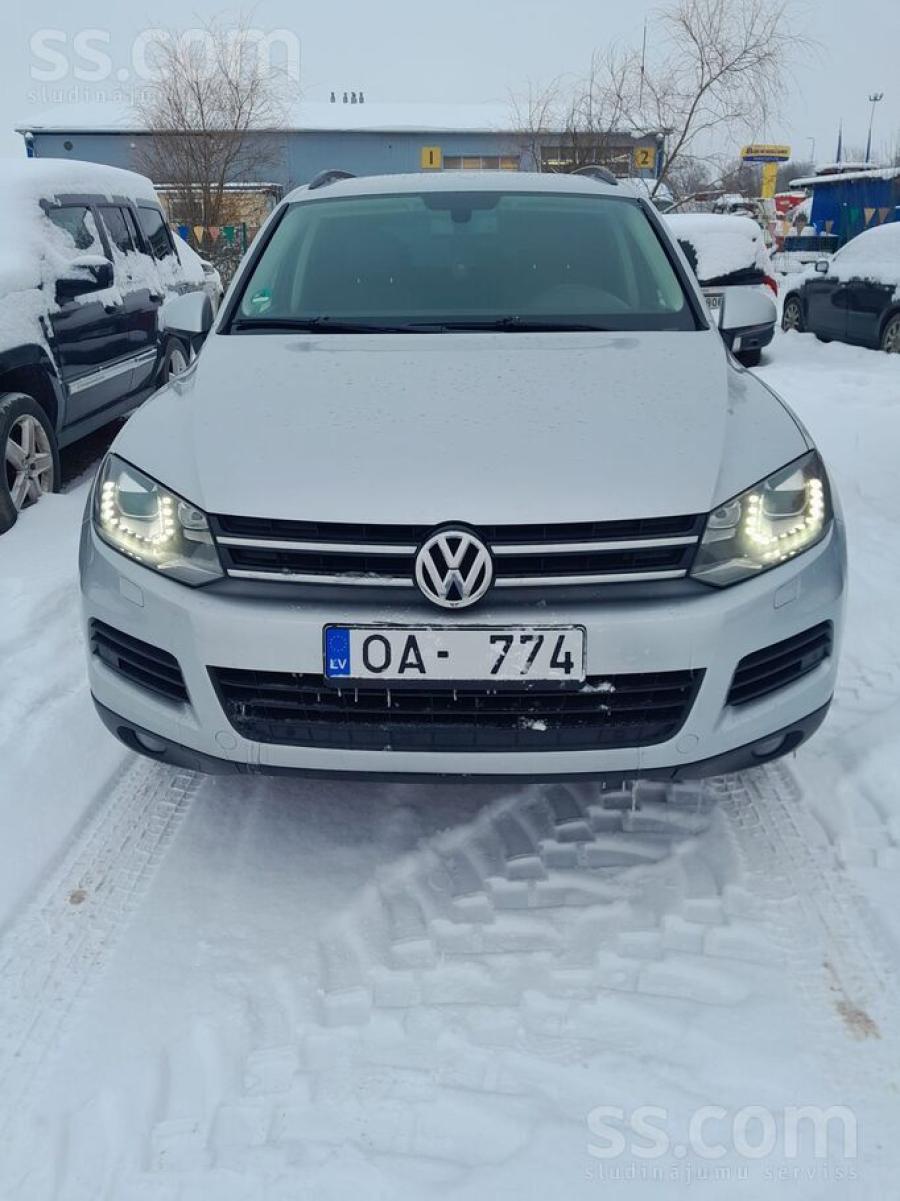 Volkswagen Touareg 2011 in Riga, with an engine capacity of 3.00 L and mileage of 255 thousand km for 11700 €, photo 2 on AUTOMOTO.COM.LV