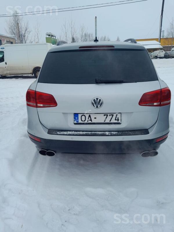 Volkswagen Touareg 2011 in Riga, with an engine capacity of 3.00 L and mileage of 255 thousand km for 11700 €, photo 3 on AUTOMOTO.COM.LV