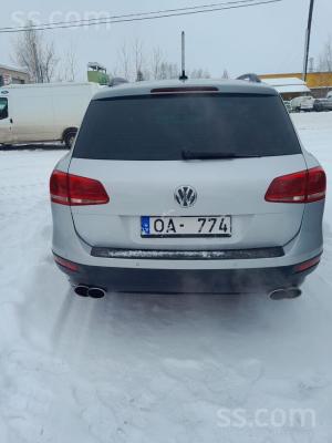 Volkswagen Touareg 2011 in Riga, with an engine capacity of 3.00 L and mileage of 255 thousand km for 11700 €, photo 3 on AUTOMOTO.COM.LV