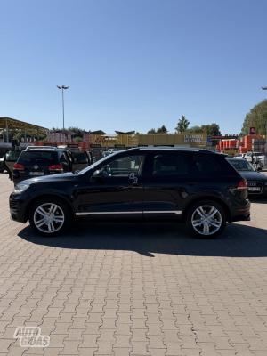 Volkswagen Touareg 2013 in Vilnius, with an engine capacity of 3.00 L and mileage of 450 thousand km for 6900 €, photo 4 on AUTOMOTO.COM.LV