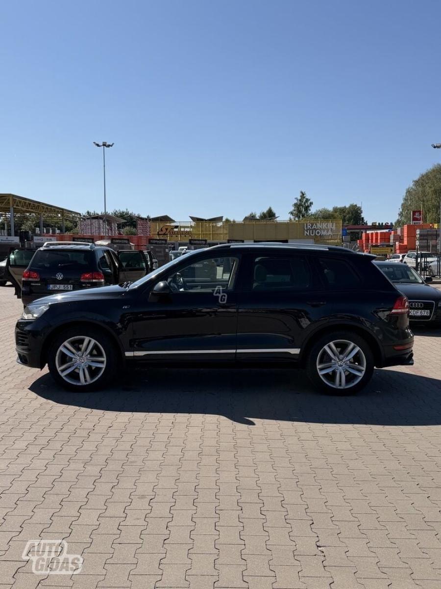 Volkswagen Touareg 2013 in Vilnius, with an engine capacity of 3.00 L and mileage of 450 thousand km for 6900 €, photo 4 on AUTOMOTO.COM.LV