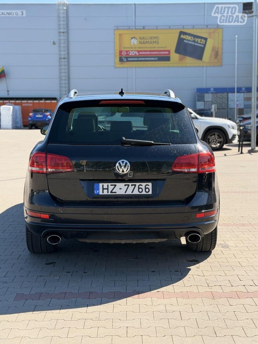 Volkswagen Touareg 2013 in Vilnius, with an engine capacity of 3.00 L and mileage of 450 thousand km for 6900 €, photo 6 on AUTOMOTO.COM.LV