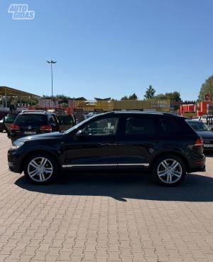 Volkswagen Touareg 2013 Trakai, ar dzinēja tilpumu 3.00 L un nobraukumu 450 tūkst. km par 6700 €, foto  vietnē AUTOMOTO.COM.LV
