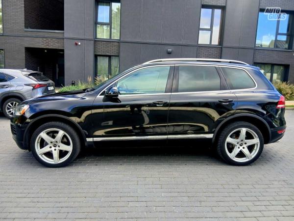 Volkswagen Touareg 2013 in Vilnius on AUTOMOTO.COM.LV Volkswagen Touareg 2013 in Vilnius, with an engine capacity of 3.60 L and mileage of 230 thousand km for 5500 €, photo 6 on AUTOMOTO.COM.LV