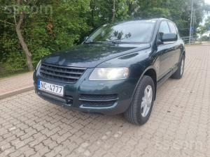 Green Volkswagen Touareg 2005 in Riga, with an engine capacity of 2.50 L and mileage of 378 thousand km for 2985 €, photo 2 on AUTOMOTO.COM.LV