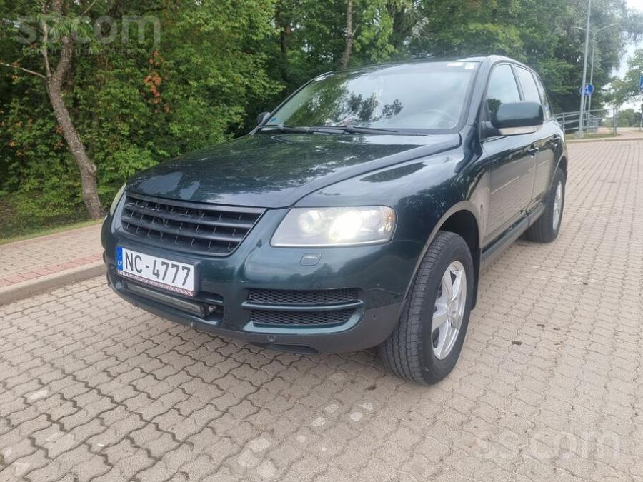 Green Volkswagen Touareg 2005 in Riga, with an engine capacity of 2.50 L and mileage of 378 thousand km for 2985 €, photo 2 on AUTOMOTO.COM.LV