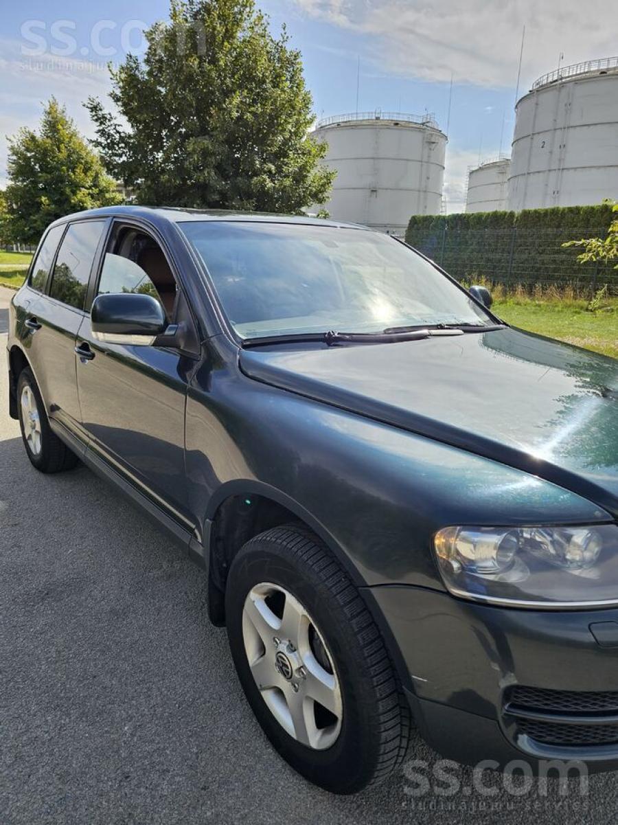 Zaļš Volkswagen Touareg 2005 Rīga, ar dzinēja tilpumu 3.00 L un nobraukumu 357 tūkst. km par 4950 €, foto 24 vietnē AUTOMOTO.COM.LV