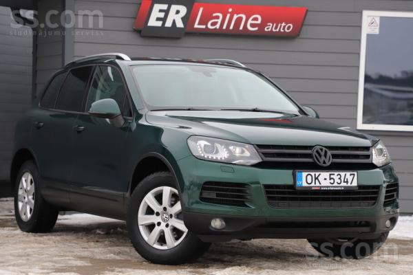 Green Volkswagen Touareg 2011 in Tukums, with an engine capacity of 3.00 L and mileage of 296 thousand km for 8900 €, photo 1 on AUTOMOTO.COM.LV