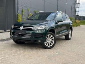 Green Volkswagen Touareg 2013 in Vilnius, with an engine capacity of 2.97 L and mileage of 298 thousand km for 12900 €, photo  on AUTOMOTO.COM.LV