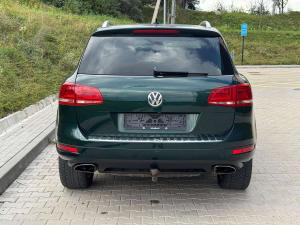 Green Volkswagen Touareg 2013 in Vilnius, with an engine capacity of 2.97 L and mileage of 298 thousand km for 12900 €, photo 5 on AUTOMOTO.COM.LV