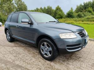 Grey Volkswagen Touareg 2003 in Liepaja, with an engine capacity of 2.50 L and mileage of 0 thousand km for 2100 €, photo  on AUTOMOTO.COM.LV