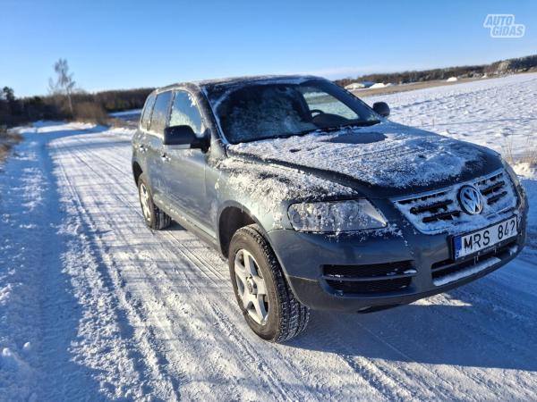 Pelēks Volkswagen Touareg 2004 Mažeikiai, ar dzinēja tilpumu 3.20 L un nobraukumu 286 tūkst. km par 2750 €, foto 1 vietnē AUTOMOTO.COM.LV
