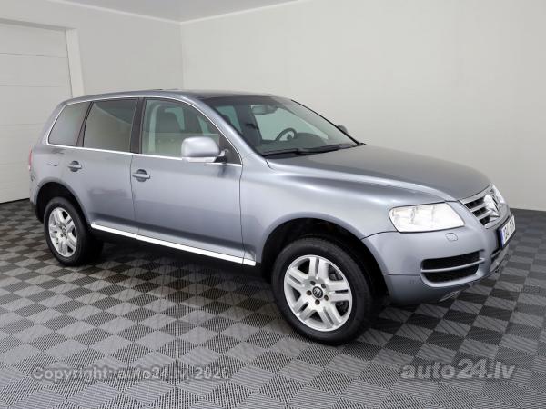 Grey Volkswagen Touareg 2004 in Tallinn, with an engine capacity of 4.90 L and mileage of 368 thousand km for 1899 €, photo 1 on AUTOMOTO.COM.LV