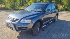 Grey Volkswagen Touareg 2004 in Jekabpils, with an engine capacity of 2.50 L and mileage of 280 thousand km for 2000 €, photo  on AUTOMOTO.COM.LV