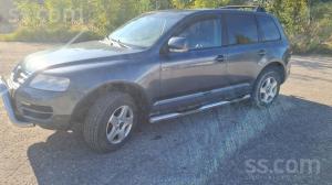 Pelēks Volkswagen Touareg 2004 Jēkabpils, ar dzinēja tilpumu 2.50 L un nobraukumu 280 tūkst. km par 2000 €, foto 7 vietnē AUTOMOTO.COM.LV