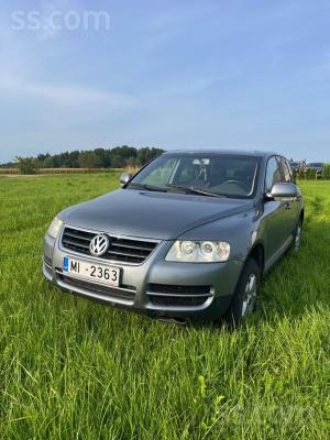 Pelēks Volkswagen Touareg 2004 Ogre, ar dzinēja tilpumu 2.50 L un nobraukumu 291 tūkst. km par 2800 €, foto 3 vietnē AUTOMOTO.COM.LV