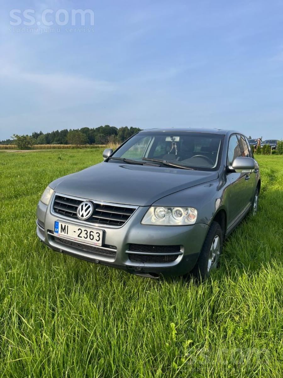 Pelēks Volkswagen Touareg 2004 Ogre, ar dzinēja tilpumu 2.50 L un nobraukumu 291 tūkst. km par 2800 €, foto 3 vietnē AUTOMOTO.COM.LV