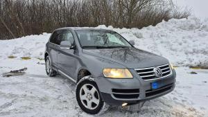 Grey Volkswagen Touareg 2005 in Klaipeda, with an engine capacity of 2.46 L and mileage of 385 thousand km for 2399 €, photo  on AUTOMOTO.COM.LV