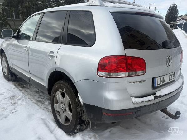 Grey Volkswagen Touareg 2005 in Kaunas, with an engine capacity of 2.50 L and mileage of 300 thousand km for 1950 €, photo 3 on AUTOMOTO.COM.LV