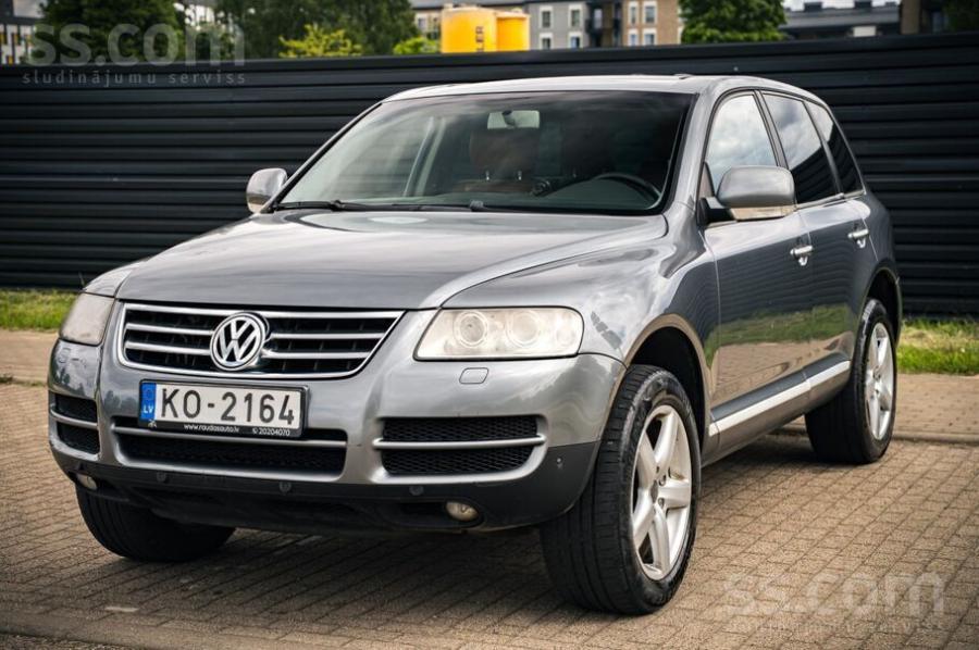 Pelēks Volkswagen Touareg 2005 Rīga, ar dzinēja tilpumu 2.50 L un nobraukumu 0 tūkst. km par 2590 €, foto 1 vietnē AUTOMOTO.COM.LV