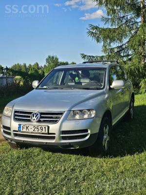 Grey Volkswagen Touareg 2005 in Riga, with an engine capacity of 3.20 L and mileage of 280 thousand km for 2300 €, photo  on AUTOMOTO.COM.LV