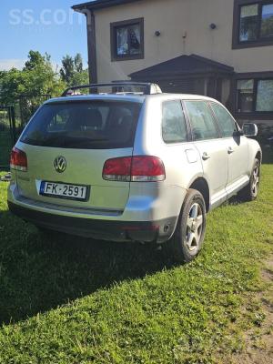 Pelēks Volkswagen Touareg 2005 Rīga, ar dzinēja tilpumu 3.20 L un nobraukumu 280 tūkst. km par 2300 €, foto 3 vietnē AUTOMOTO.COM.LV