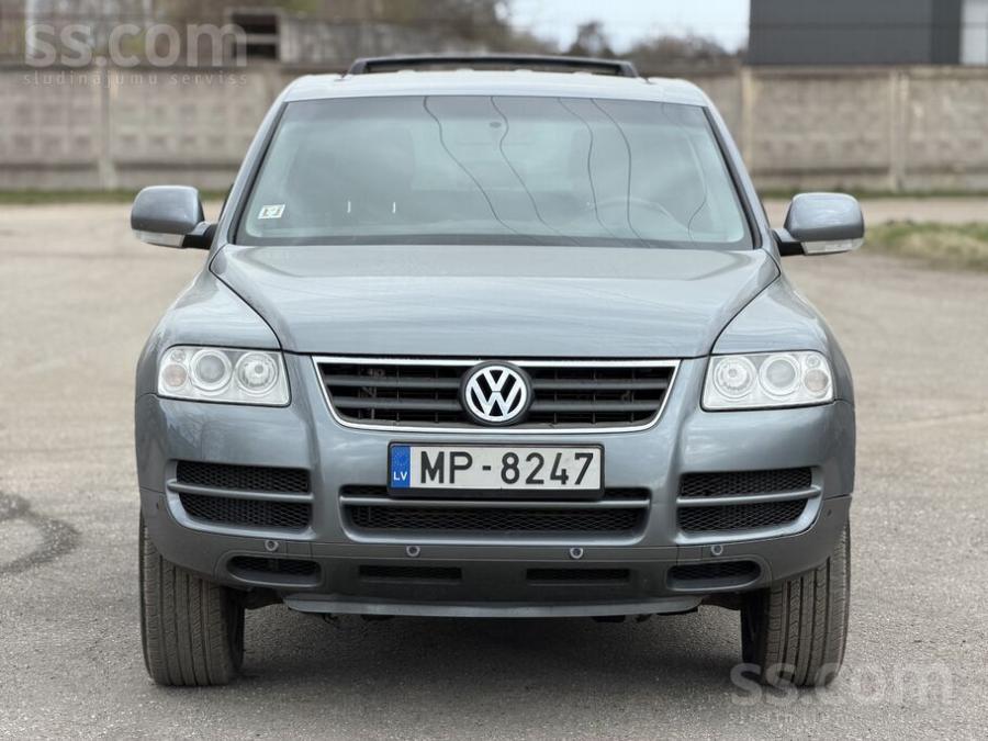 Pelēks Volkswagen Touareg 2005 Ogre, ar dzinēja tilpumu 3.00 L un nobraukumu 228 tūkst. km par 2500 €, foto 3 vietnē AUTOMOTO.COM.LV
