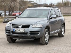 Pelēks Volkswagen Touareg 2005 Ogre, ar dzinēja tilpumu 3.00 L un nobraukumu 228 tūkst. km par 2500 €, foto 4 vietnē AUTOMOTO.COM.LV