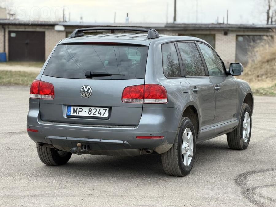 Pelēks Volkswagen Touareg 2005 Ogre, ar dzinēja tilpumu 3.00 L un nobraukumu 228 tūkst. km par 2500 €, foto 6 vietnē AUTOMOTO.COM.LV