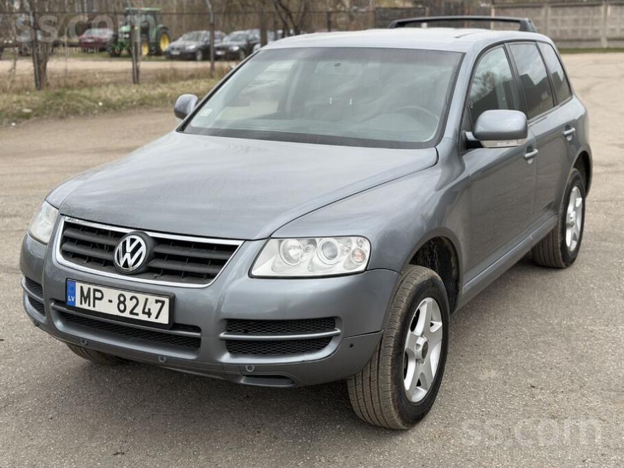 Pelēks Volkswagen Touareg 2005 Ogre, ar dzinēja tilpumu 3.00 L un nobraukumu 228 tūkst. km par 2500 €, foto 12 vietnē AUTOMOTO.COM.LV