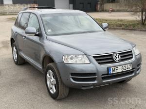 Pelēks Volkswagen Touareg 2005 Ogre, ar dzinēja tilpumu 3.00 L un nobraukumu 228 tūkst. km par 2500 €, foto 13 vietnē AUTOMOTO.COM.LV
