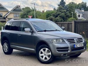 Grey Volkswagen Touareg 2005 in Riga, with an engine capacity of 3.00 L and mileage of 327 thousand km for 4150 €, photo 3 on AUTOMOTO.COM.LV