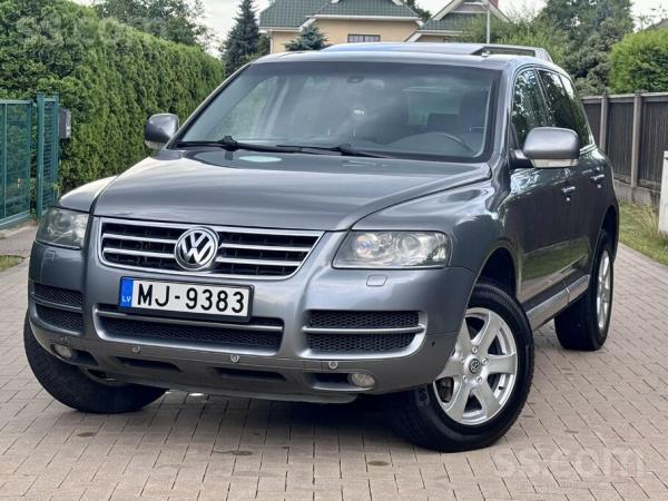 Grey Volkswagen Touareg 2005 in Riga, with an engine capacity of 3.00 L and mileage of 327 thousand km for 4150 €, photo 3 on AUTOMOTO.COM.LV