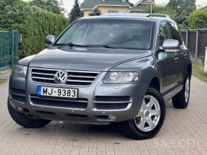 Grey Volkswagen Touareg 2005 in Riga, with an engine capacity of 3.00 L and mileage of 327 thousand km for 4150 €, photo 4 on AUTOMOTO.COM.LV
