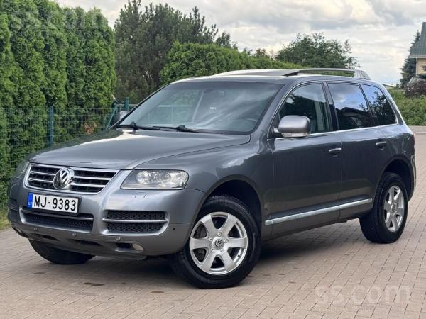 Grey Volkswagen Touareg 2005 in Riga, with an engine capacity of 3.00 L and mileage of 327 thousand km for 4150 €, photo 4 on AUTOMOTO.COM.LV