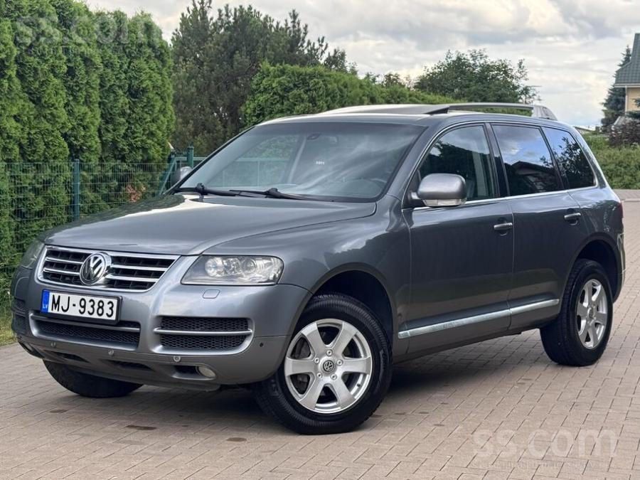 Grey Volkswagen Touareg 2005 in Riga, with an engine capacity of 3.00 L and mileage of 327 thousand km for 4150 €, photo 5 on AUTOMOTO.COM.LV