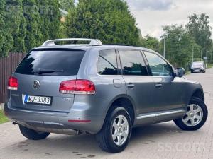 Grey Volkswagen Touareg 2005 in Riga, with an engine capacity of 3.00 L and mileage of 327 thousand km for 4150 €, photo 7 on AUTOMOTO.COM.LV