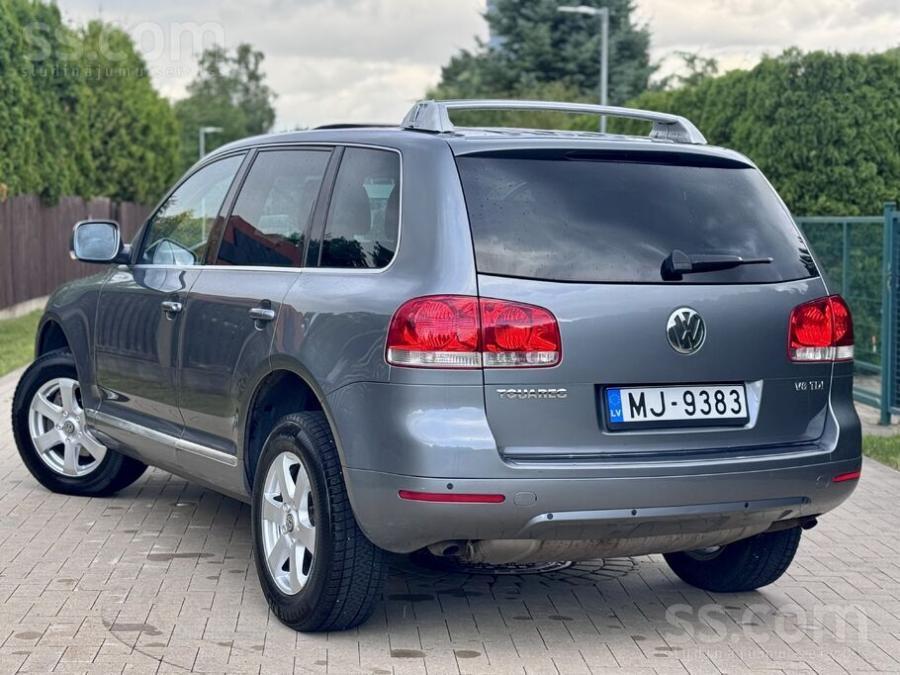 Grey Volkswagen Touareg 2005 in Riga, with an engine capacity of 3.00 L and mileage of 327 thousand km for 4150 €, photo 8 on AUTOMOTO.COM.LV