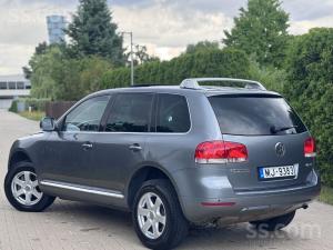 Grey Volkswagen Touareg 2005 in Riga, with an engine capacity of 3.00 L and mileage of 327 thousand km for 4150 €, photo 9 on AUTOMOTO.COM.LV