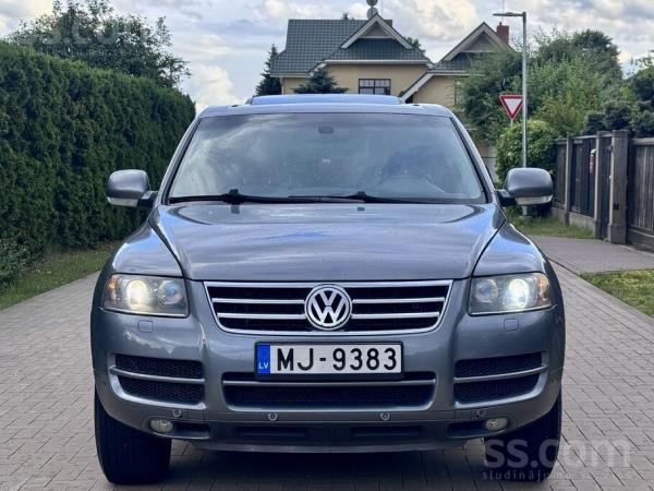 Grey Volkswagen Touareg 2005 in Riga, with an engine capacity of 3.00 L and mileage of 327 thousand km for 4150 €, photo 9 on AUTOMOTO.COM.LV